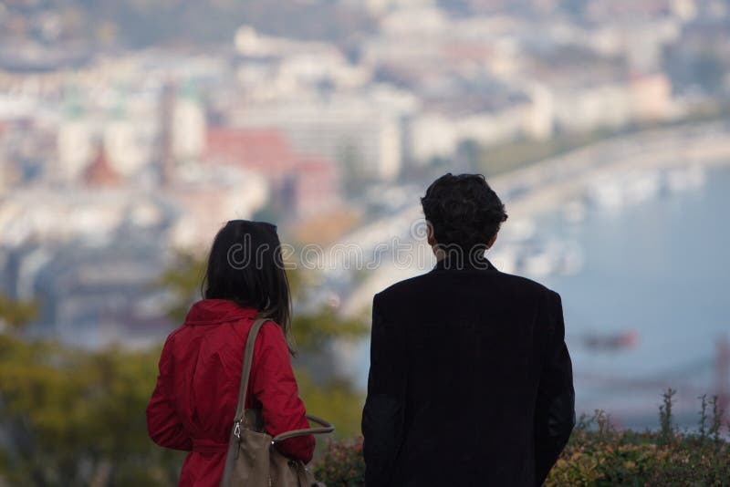 Back of Man and Woman on Blurred Blackground Editorial Stock Photo ...