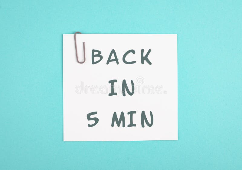 Back in 5 Min Ist Standing on a Paper, Hands Hold Message, Working ...