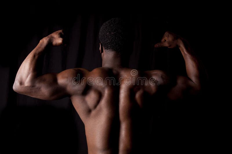 Strong Back of a Black Muscular Man Stock Image - Image of conscious ...