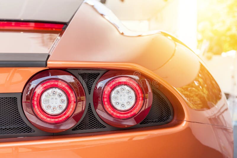 Back of an Orange Sport Luxury Car in Sunset Stock Image - Image of ...