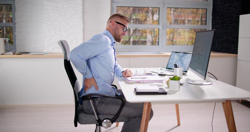 Back Pain Bad Posture Man Sitting Stock Photo - Image of sore ...