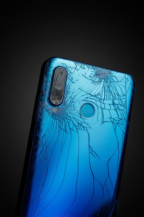 The Back Panel of a Broken Mobile Phone. Damaged Smartphone Camera ...