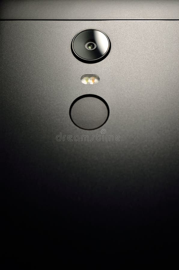 Back Panel and Smartphone Camera in the Dark, Close Up Stock Photo ...