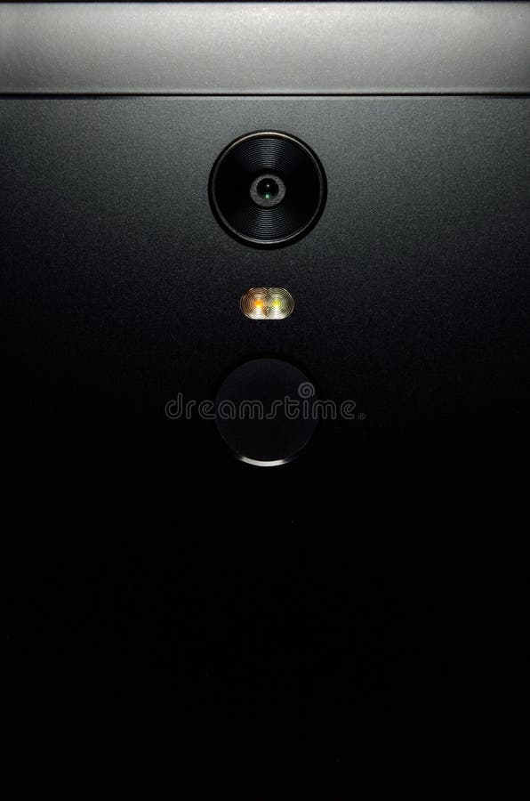 Back Panel and Smartphone Camera in the Dark, Close Up Stock Photo ...