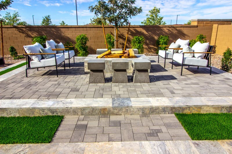 Back Patio Conversation Area with Fire Pit Stock Photo - Image of wall ...