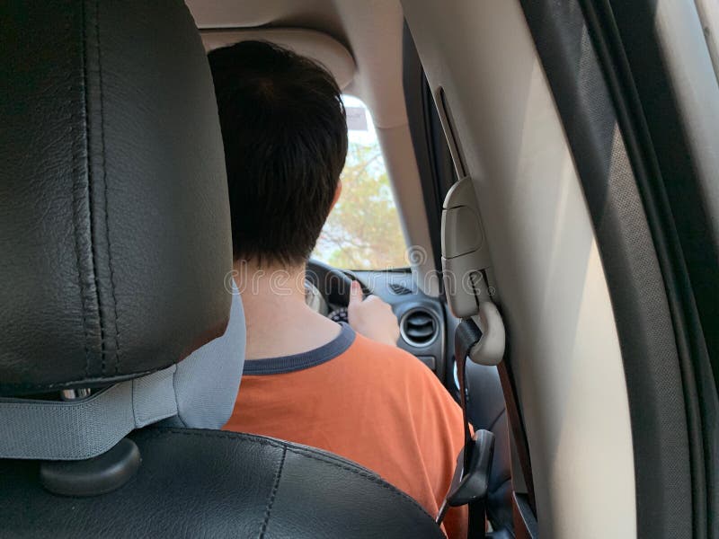 The Back Photos of Men Driving Inside the Car Stock Image - Image of ...