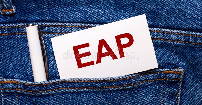 The Back Pocket of Blue Jeans Contains a White Pen and a White Card ...