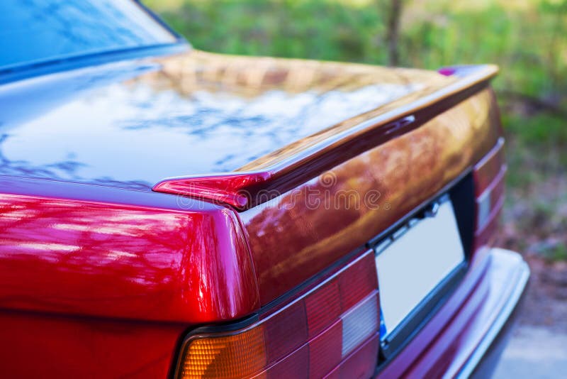 The Back of a Red Retro Car with a Small Wing Stock Photo - Image of ...