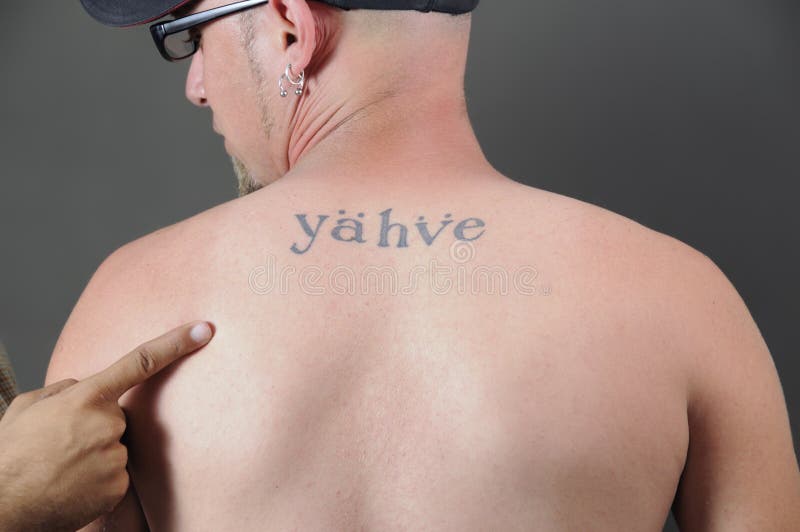 Back religious tattoo stock image. Image of back, sign - 5708873