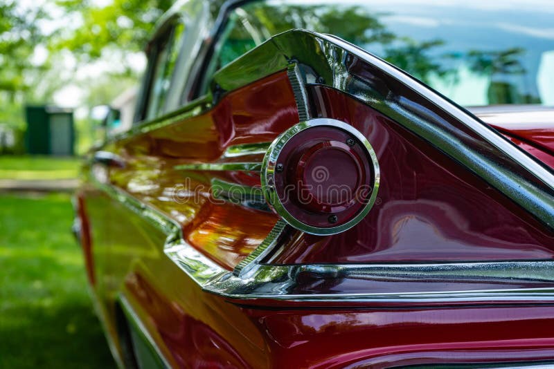 The Back of a Retro Car from the 60s. Rear Wing Tail Unit of Red Color ...