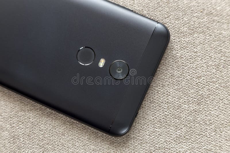 Back Side of Black Cellphone Isolated with Security Thumb Fingerprint ...