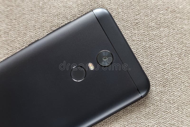 Back Side of Black Cellphone Isolated with Security Thumb Fingerprint ...