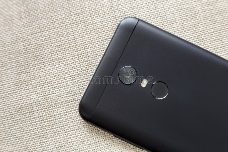 Back Side of Black Cellphone Isolated with Security Thumb Fingerprint ...