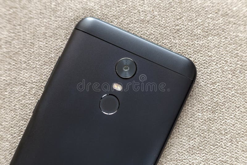 Back Side of Black Cellphone Isolated with Security Thumb Fingerprint ...