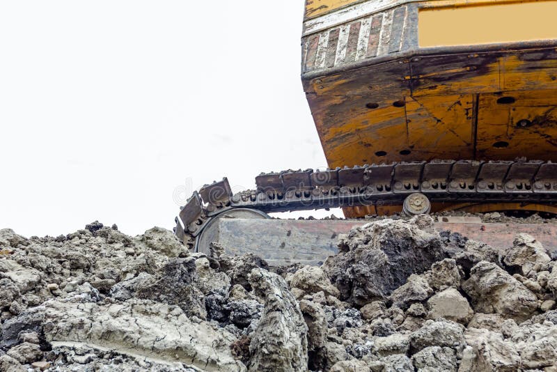 Back Side of Crawler Excavator on Pile of Ground at Building Sit Stock ...