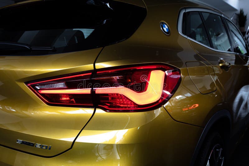 Back side of golden BMW editorial image. Image of closeup - 235571430