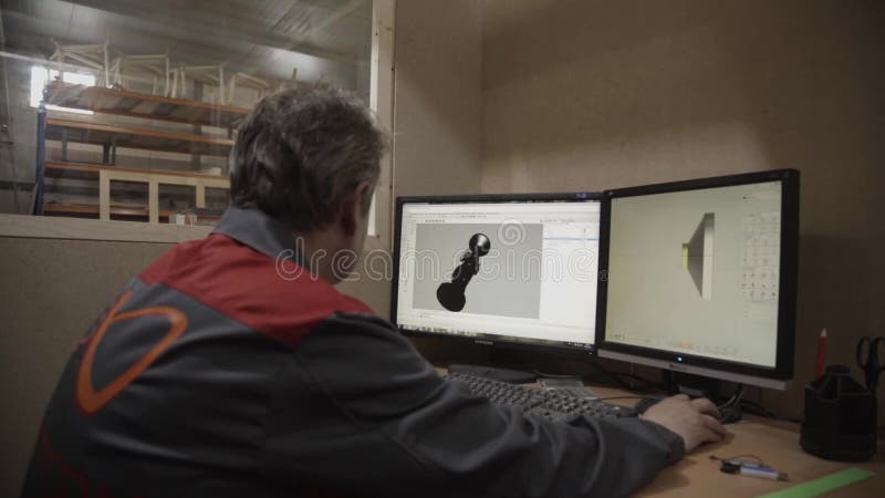 Back Side of Man at a Table Design Black Statue of Woman in a Computer ...