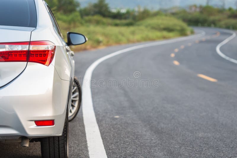 Back Side of New Silver Car Parking on the Asphalt Road Stock Photo ...
