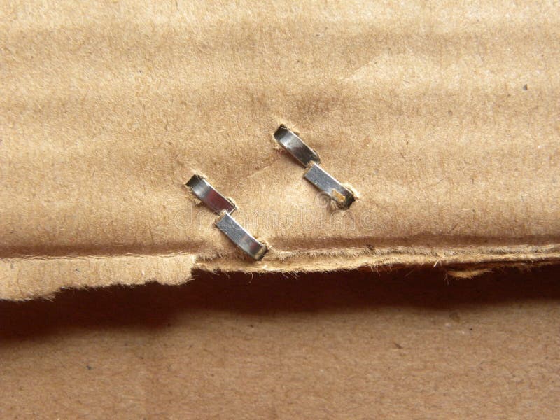 Staples on cardboard box stock image. Image of needle - 152317789
