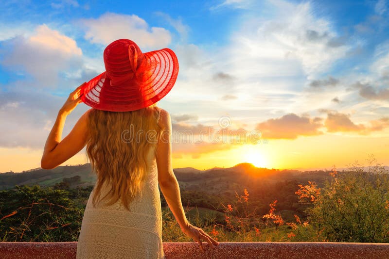 A Back Side View on a Wonderful Young Woman Watching Sunset. Stock ...