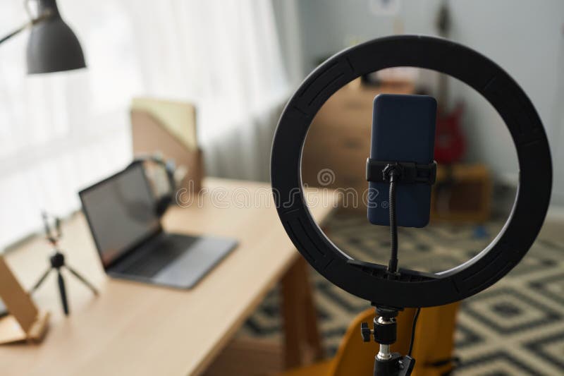 Back of Smartphone in Holder Inside Round Frame Standing in Front of ...