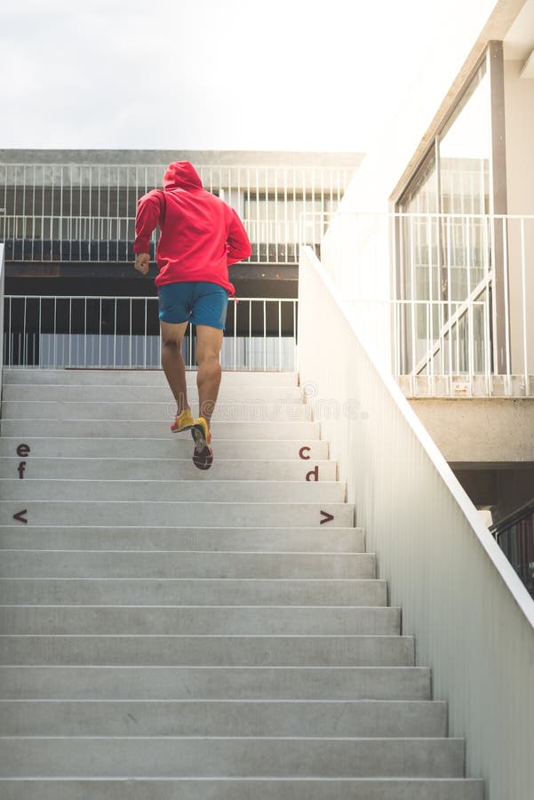 Back of Sport Man in Red Hood Running Up Stock Photo - Image of ...