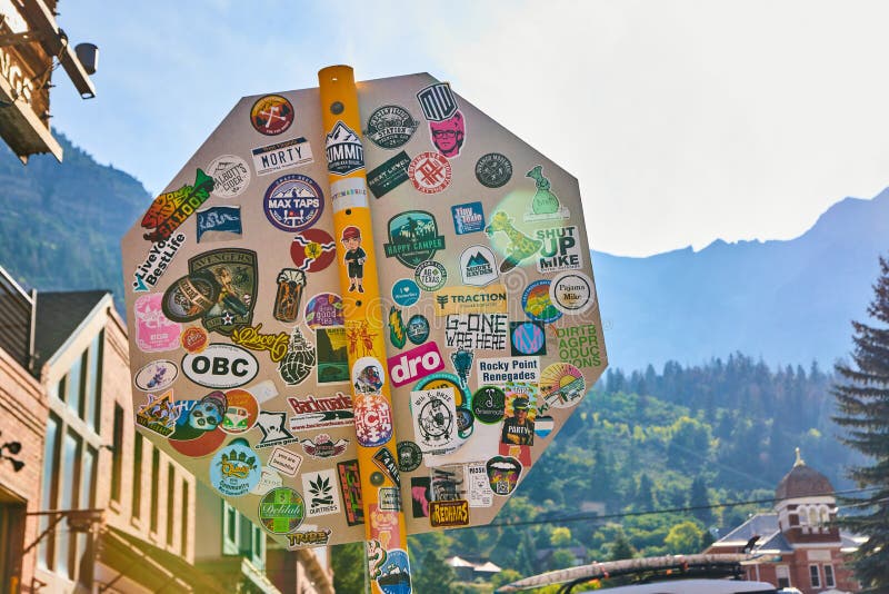 Back of Stop Sign Covered in Stickers in Small Town Editorial Image ...