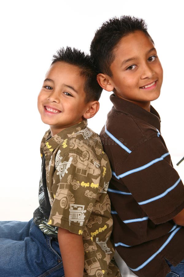 Two Hispanic Young Brothers Smiling Stock Photo - Image of hands, happy ...