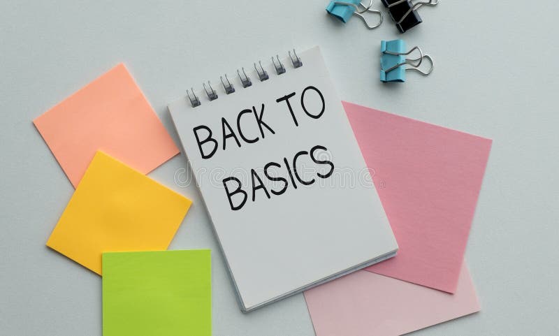 Back To Basics Text on Open Notebook with Sticky Notes and Paper Clips ...