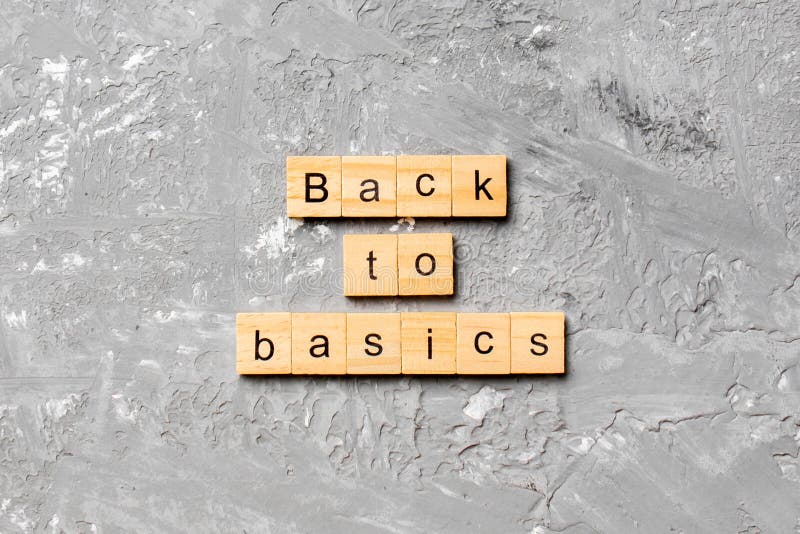 Back To Basics Word Written on Wood Block. Back To Basics Text on Table ...