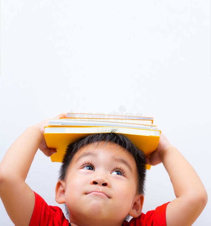 Back To School, Asian Student Boy Kid Stack Book Balanced Over Head he ...