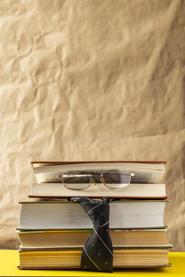 Back To School Concept. Stack of Books and a Tie Stock Image - Image of ...