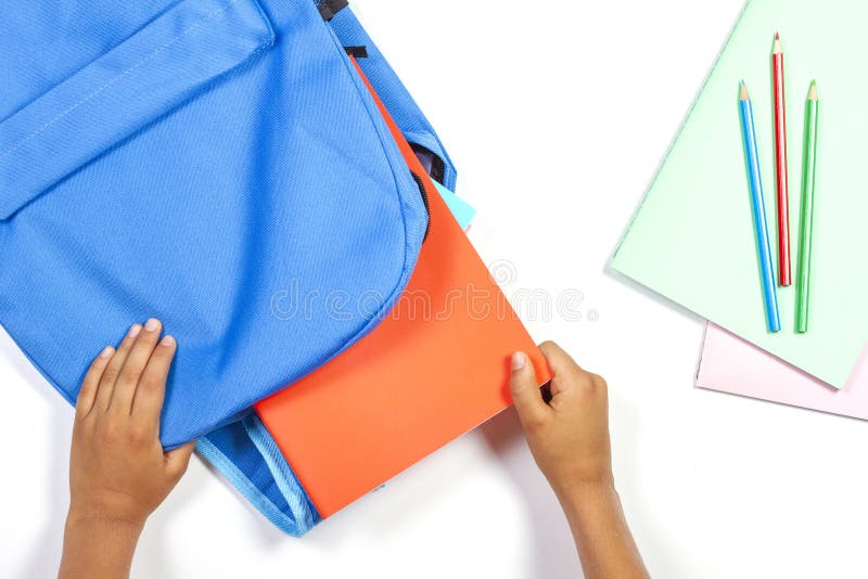 Back To School, Education Concept. Kid Hands Packing Backpack and ...