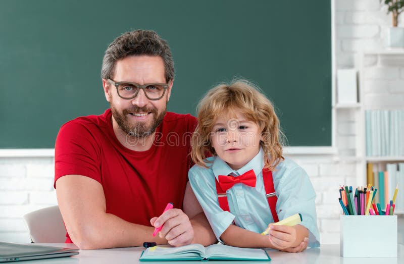 Back To School. Father Teacher Helping a Son Boy in School Lessons ...