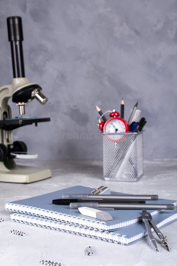 Back To School. Group of School Supplies, Red Alarm Clock, Microscope ...