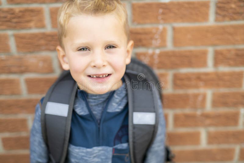 A Back To School. Happy Little Boy with Backpack Stock Photo - Image of ...