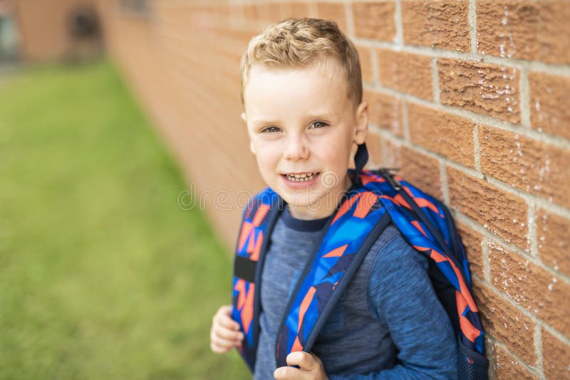 A Back To School. Happy Little Boy with Backpack Stock Photo - Image of ...