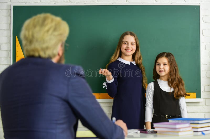Back To School. Help and Support. Elementary Pupil with Teacher in ...