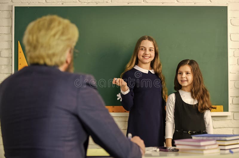 Back To School. Help and Support. Elementary Pupil with Teacher in ...