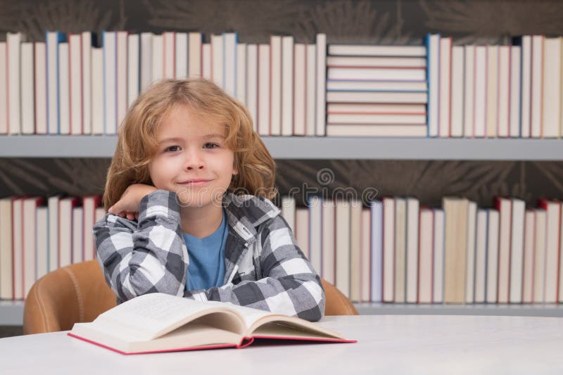 Kid Reading Book in a Book Store or Library, Stock Photo - Image of ...