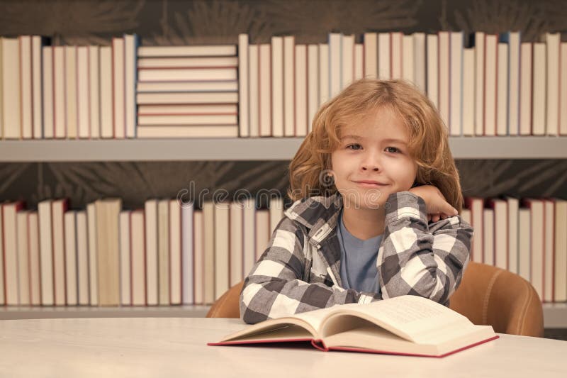 Kid Reading Book in a Book Store or Library, Stock Photo - Image of ...