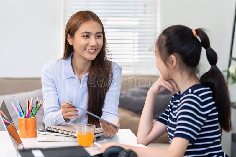 Back To School and Positive Learning. Smiling Educator and Student ...