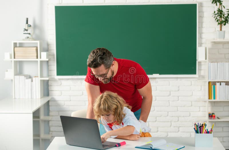 Back To School. School Pupil with Teacher Learning at Laptop Computer ...