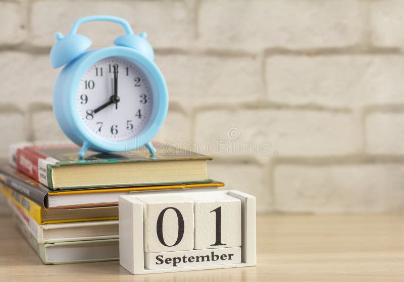 Back To School, September 1 on the Calendar. Alarm Clock and a Stack of ...