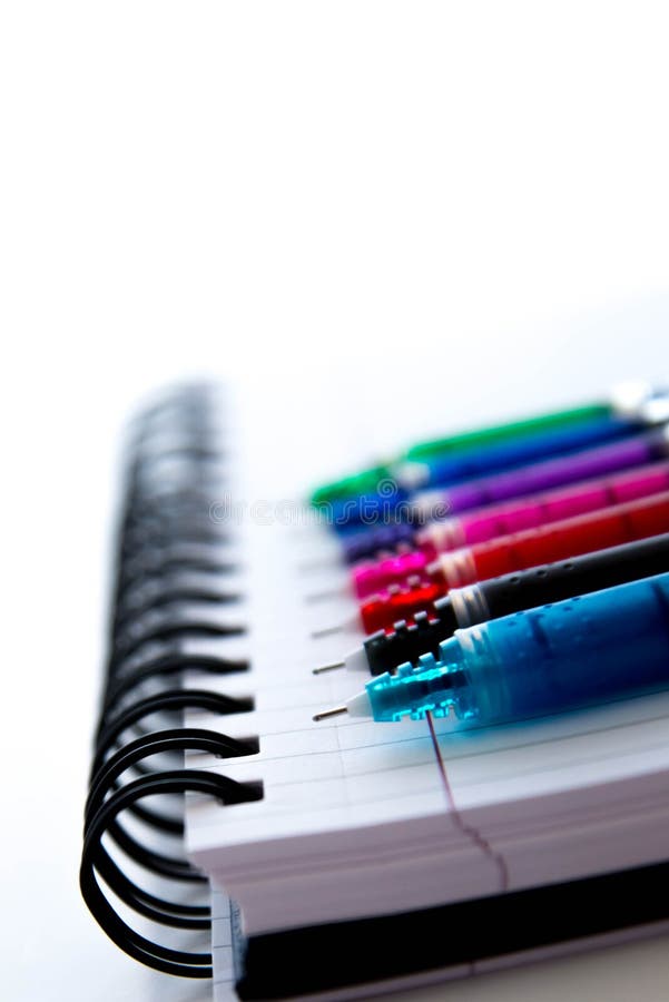 Back To School Supplies, Multi Colored Pens and a Spiral Notebook Stock ...