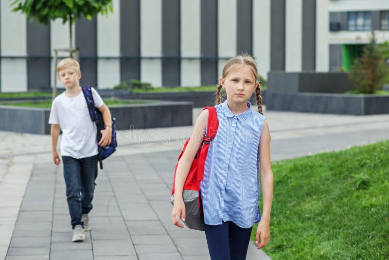 Back To School. Teenagers with Backpacks Go To School To Study Stock ...