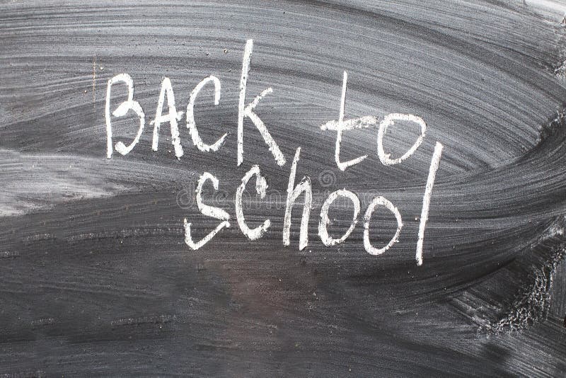 Back To School Written on a Black Chalkboard with Chalk Stock Image ...