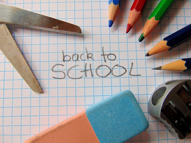 Back To School Written in the Middle of School Material Stock Image ...