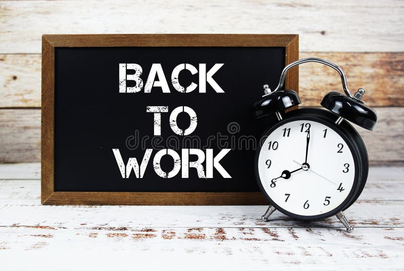 Back To Work Text Message and Alarm Clock on Wooden Background Stock ...