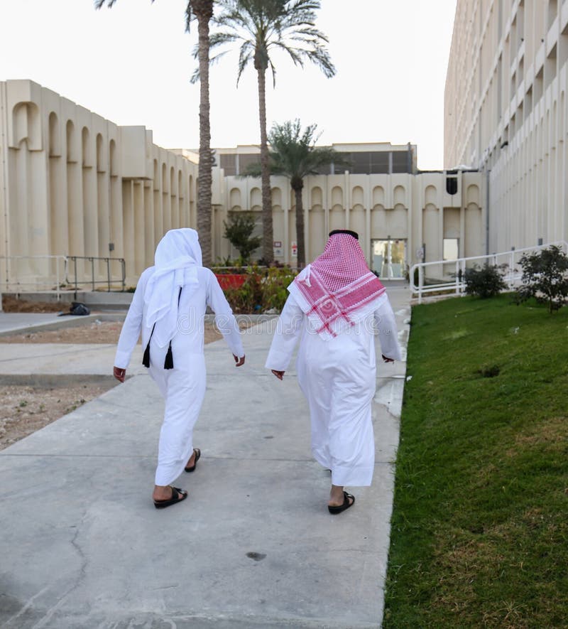Back of Two Arabic Men Walking in Qatar Editorial Image - Image of ...